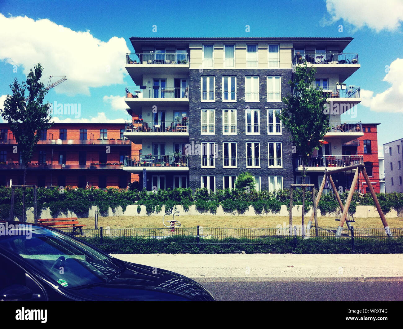 Playground In Front Of Building Stock Photo - Alamy