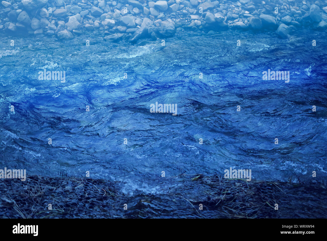 Macro photo background with transparent blue river of sea water ...