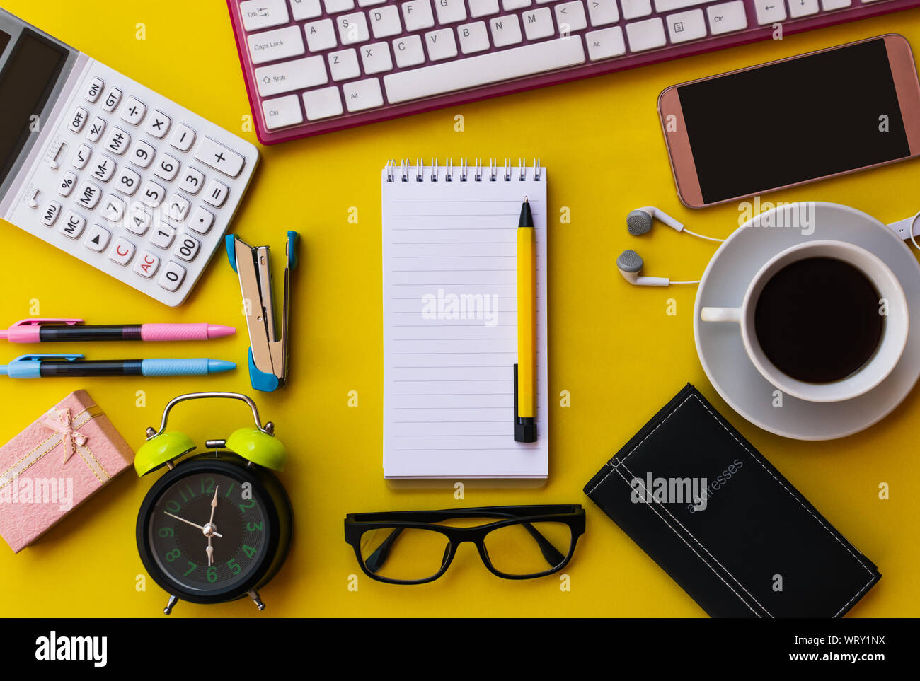 Blank white notepad with office and personal accessories isolated on ...