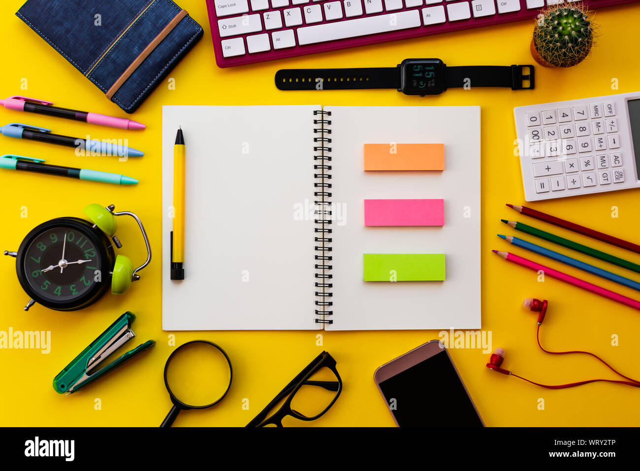 Blank white notepad with office and personal accessories isolated on ...