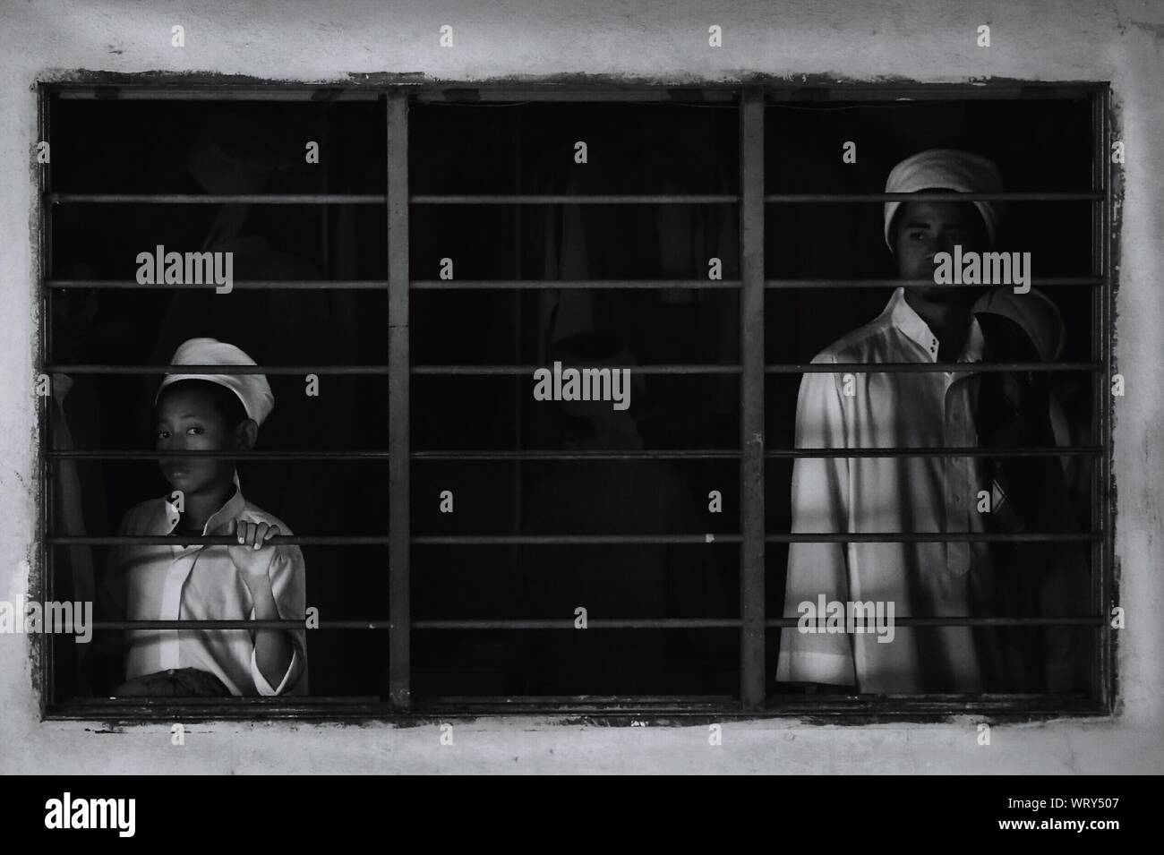 People Looking Through Window Stock Photo - Alamy