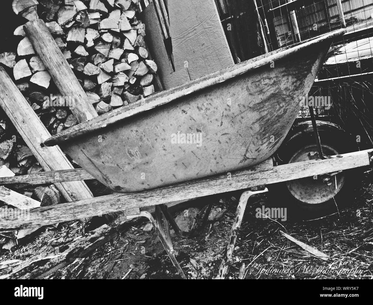 Old Wheelbarrow Stock Photos & Old Wheelbarrow Stock Images - Alamy