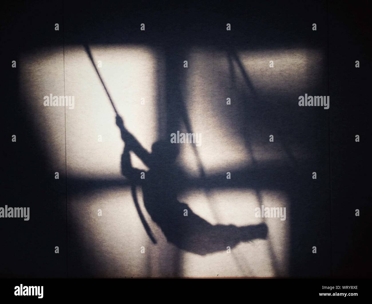 Shadow child on swing hi-res stock photography and images - Alamy