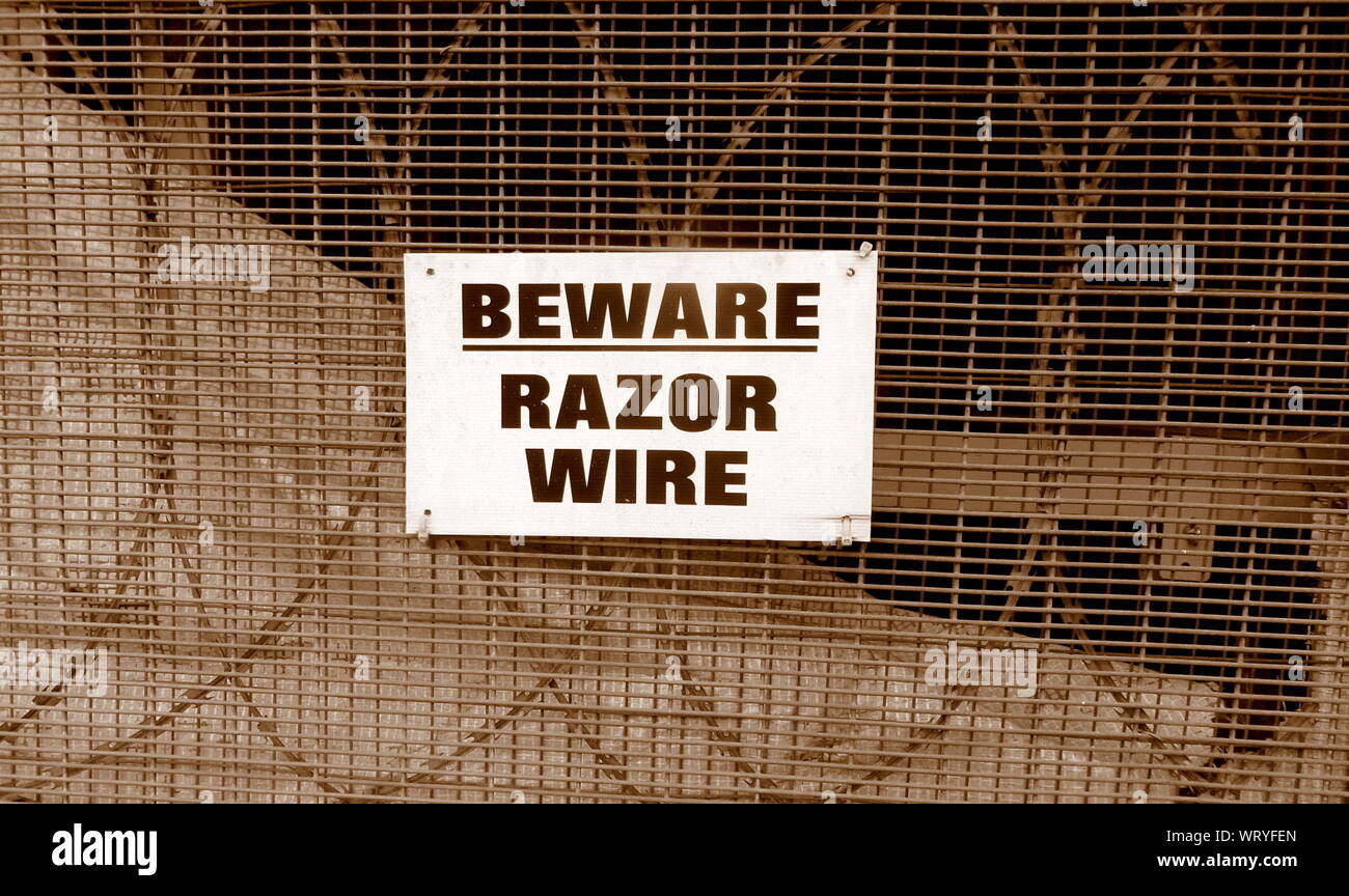 Warning Razor Wire High Resolution Stock Photography and Images - Alamy