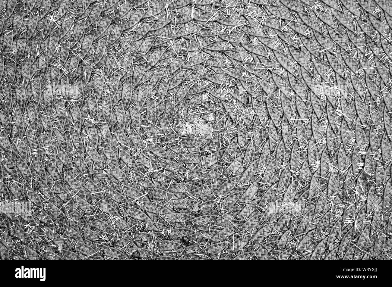 Abstract background. White dashes and black dashes in a circular ...