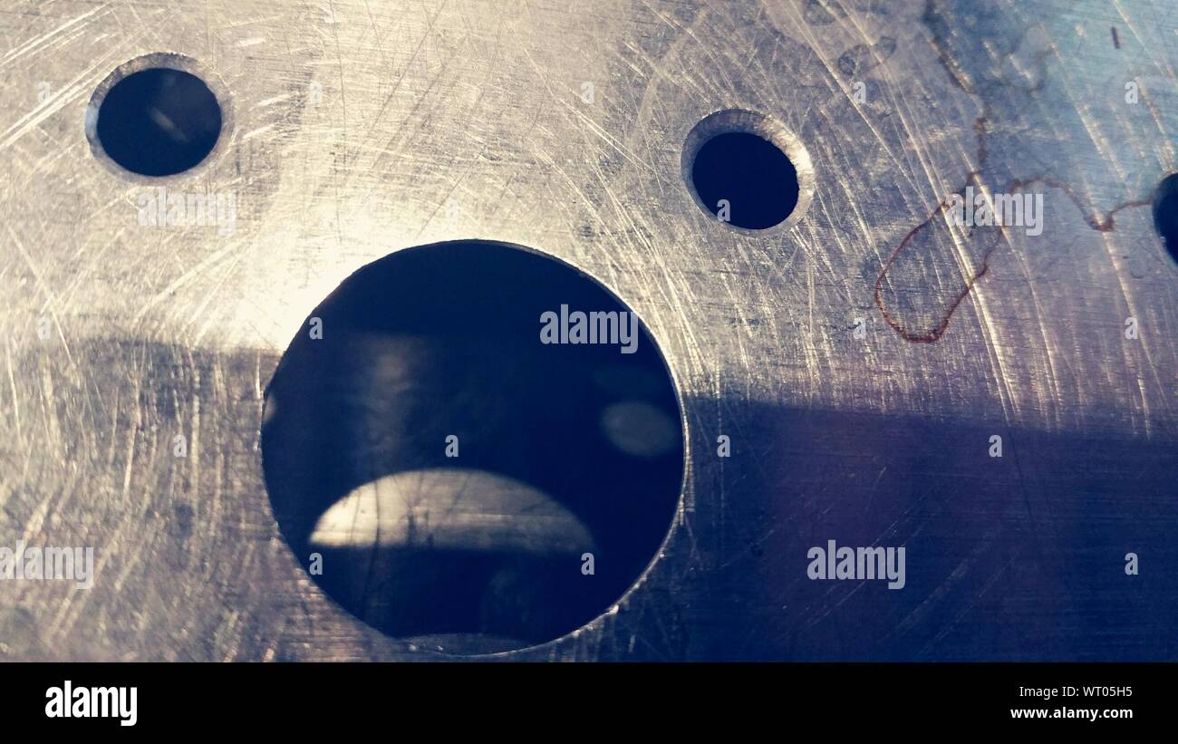 Holes In Shiny Metal High Resolution Stock Photography and Images - Alamy