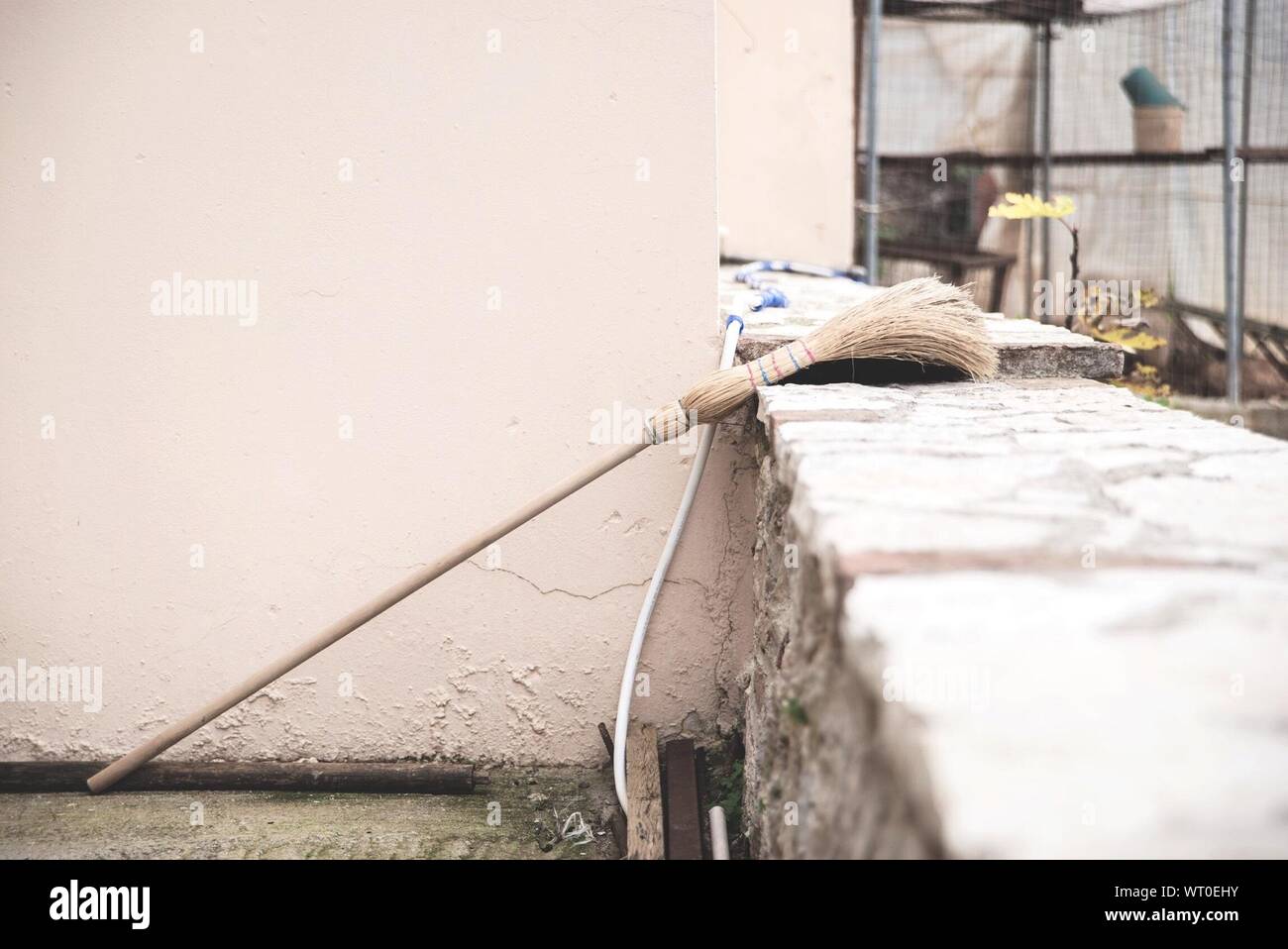 Leaning broom hi-res stock photography and images - Alamy