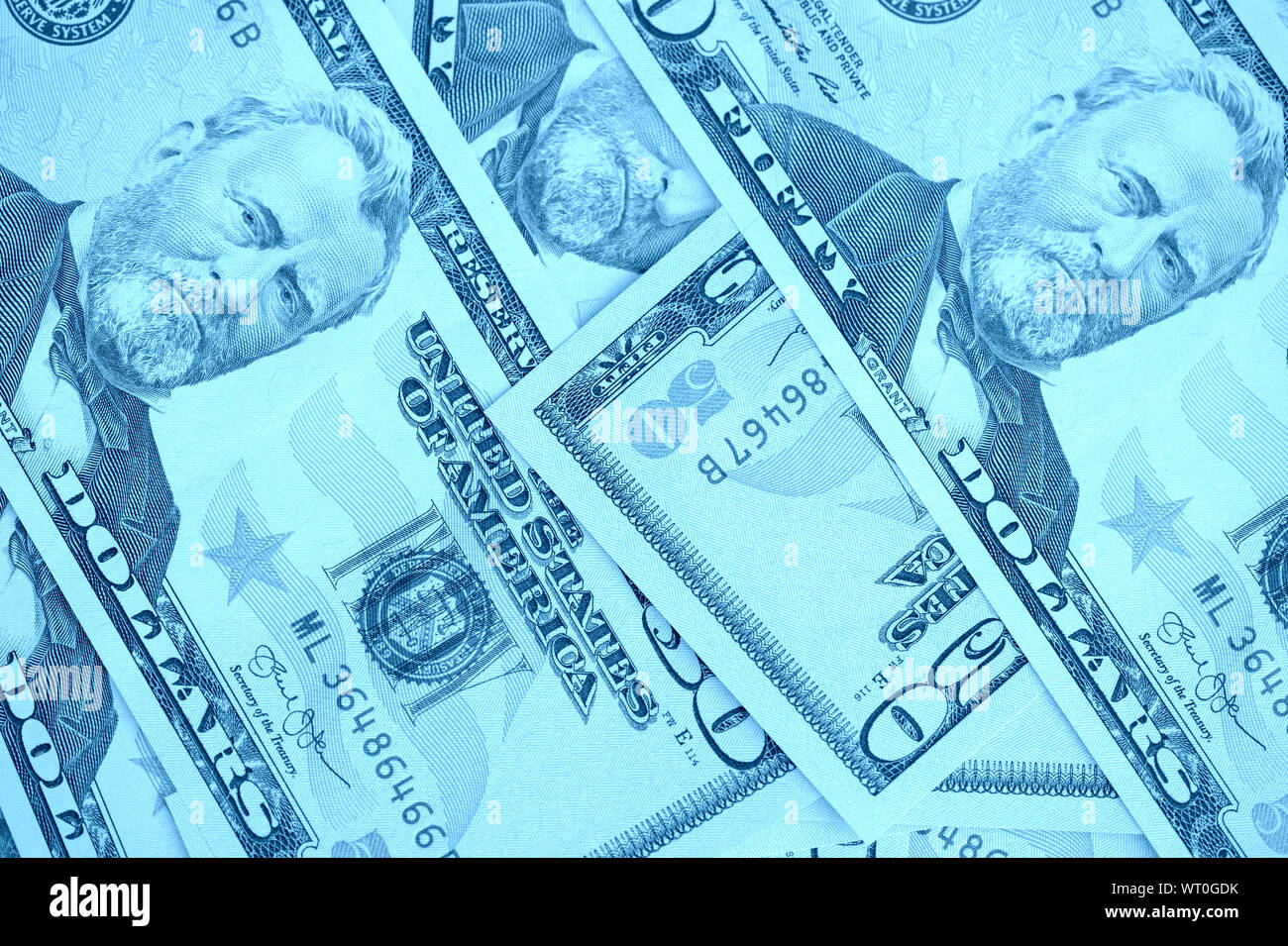 USD fifty dollar bills close up. Money background blue color toned ...