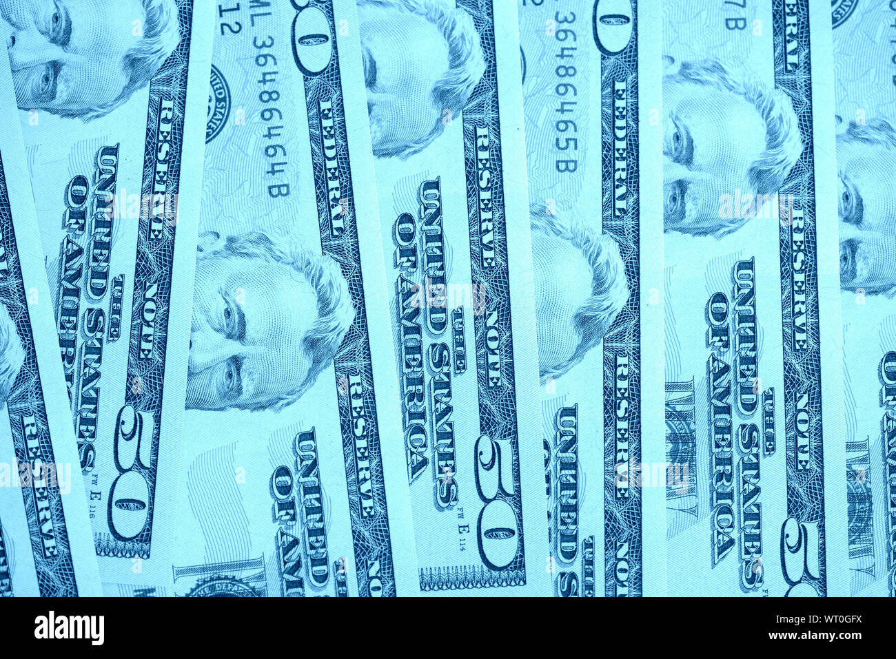 USD fifty dollar bills close up. Money background blue color toned ...