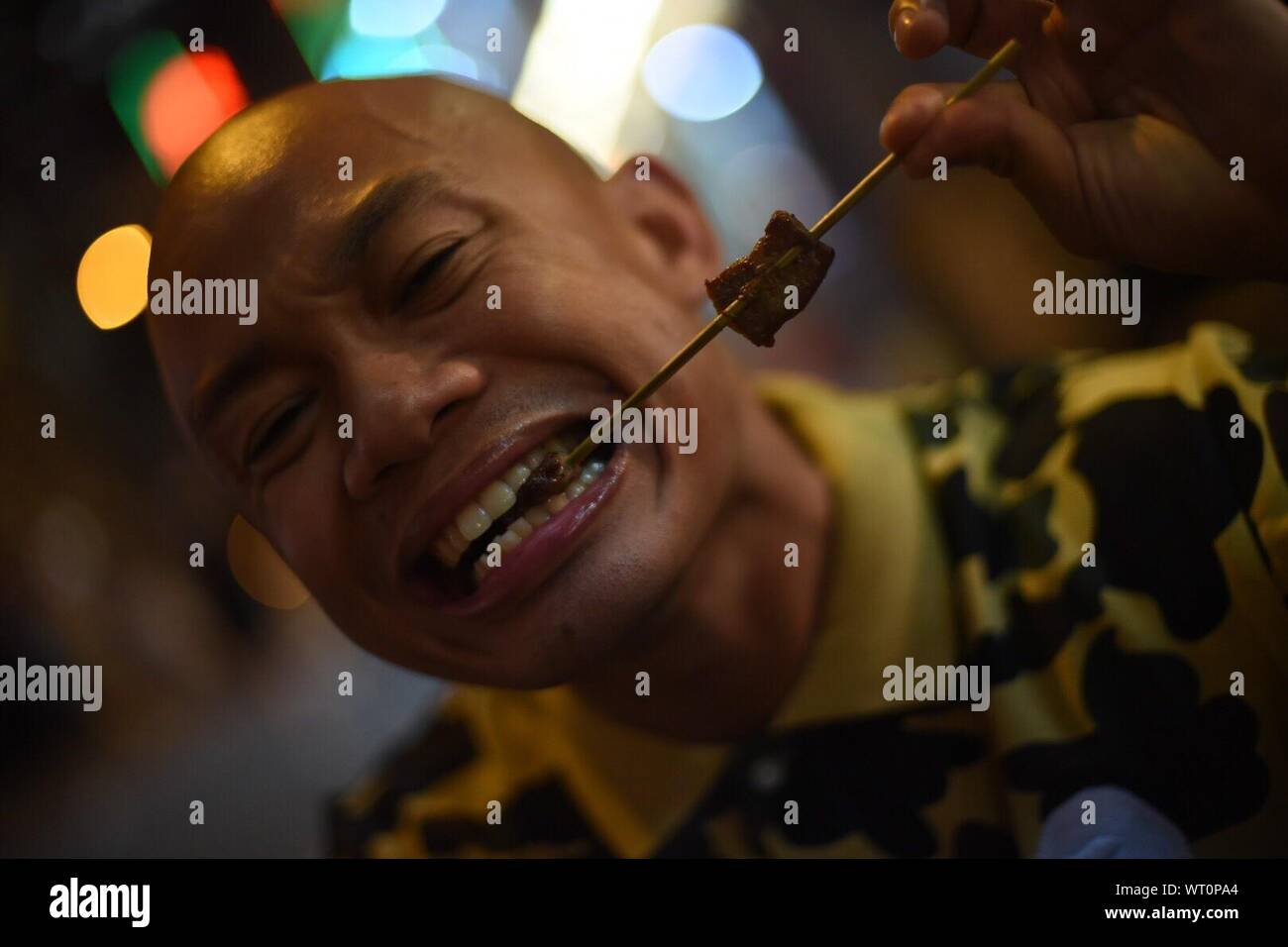 Portrait man eating hi-res stock photography and images - Alamy