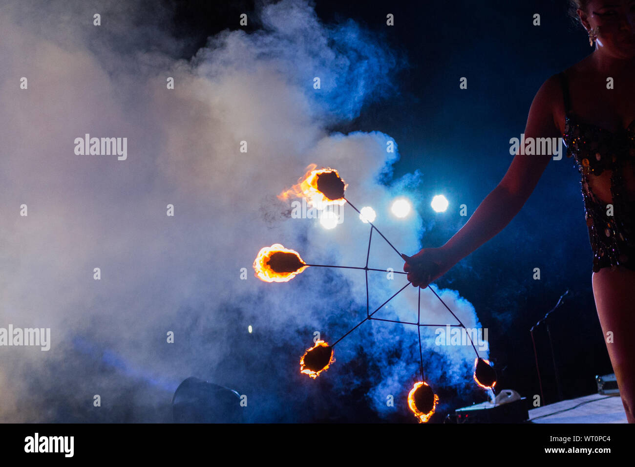 Young fire performer hi-res stock photography and images - Alamy