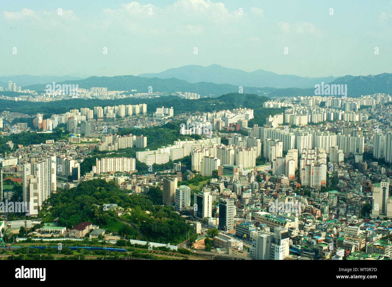 Seoul city street view from top in summer in Korea toned in blue-green ...