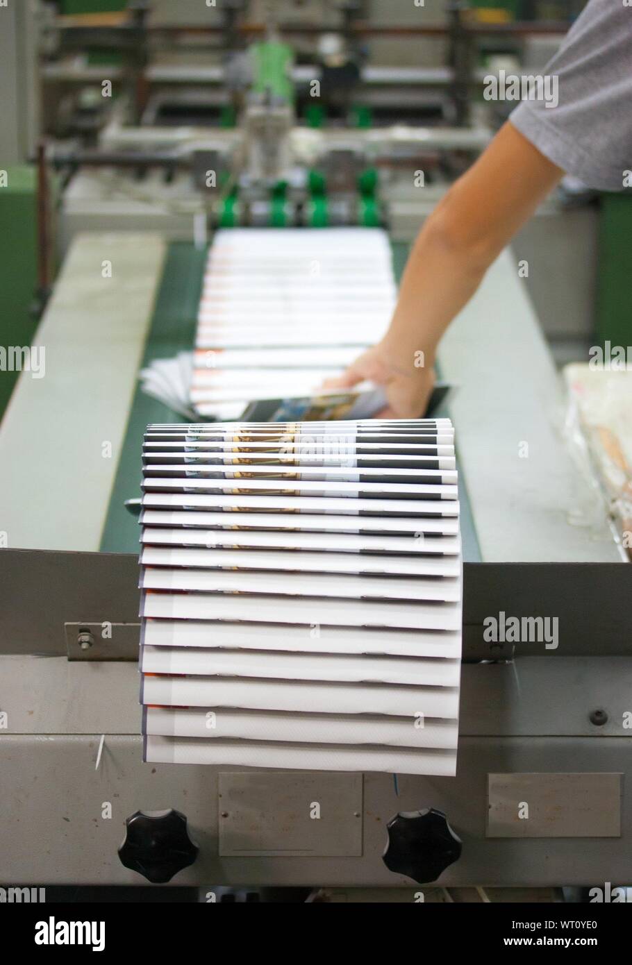 Stack book production line hi-res stock photography and images - Alamy