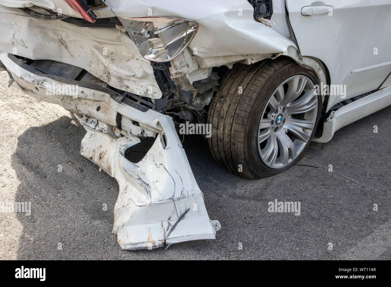 crashed white BMW car corner Stock Photo - Alamy