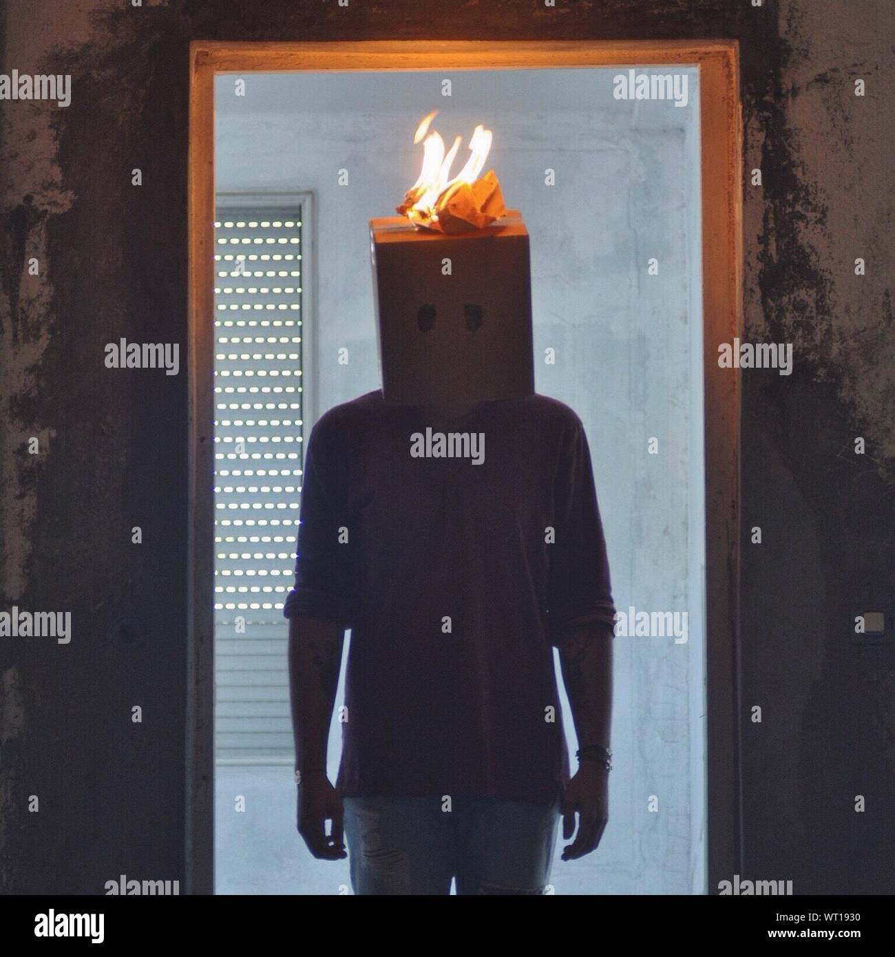Burning face hi-res stock photography and images - Alamy