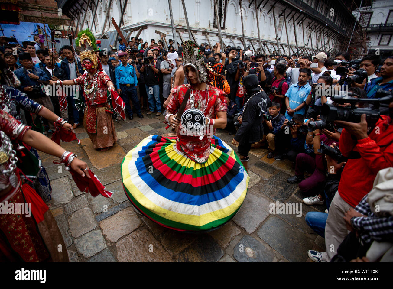 Beijing, Nepal. 10th Sep, 2019. Masked dancers perform on the first day ...
