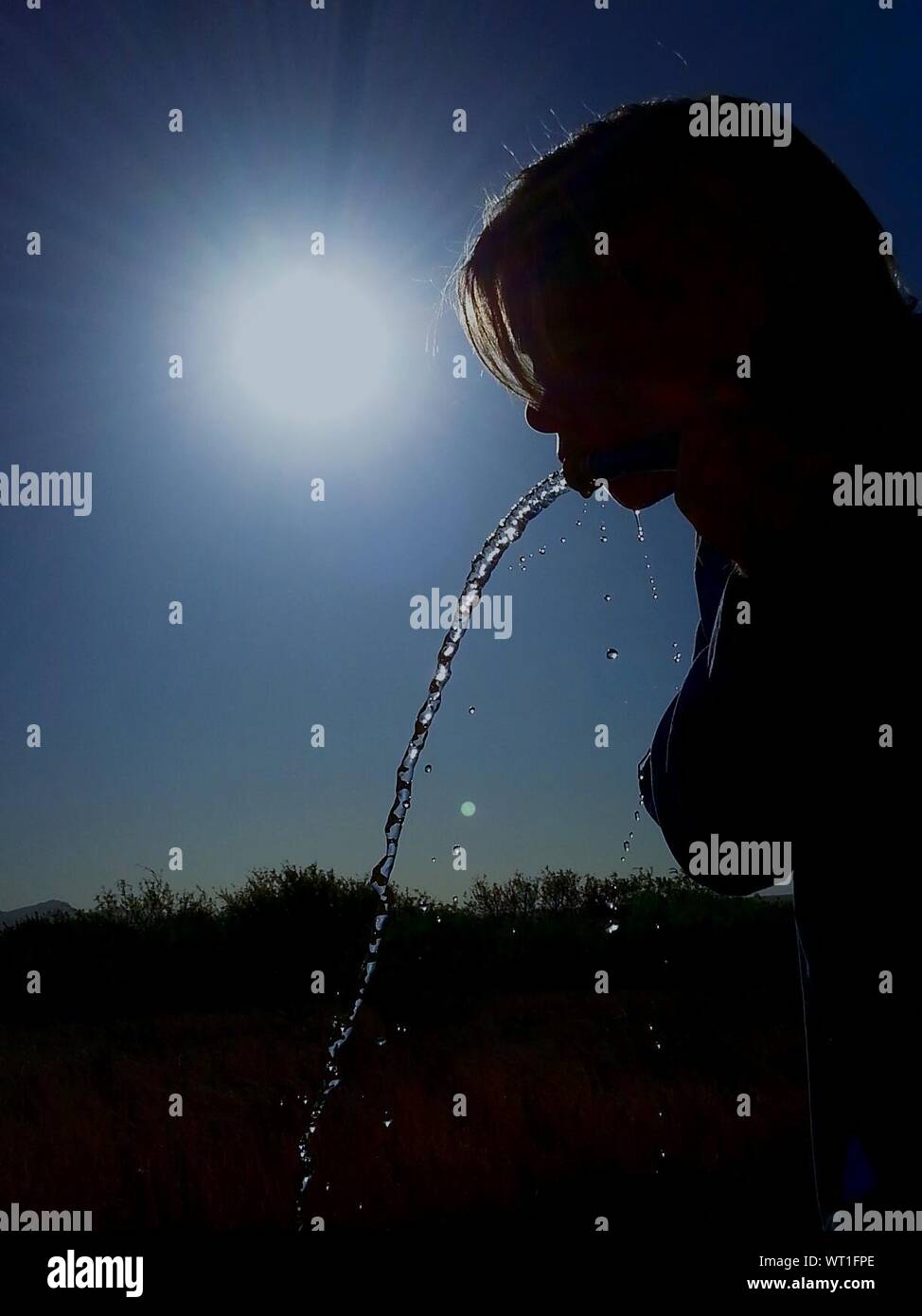 Boy Spitting Water High Resolution Stock Photography and Images - Alamy