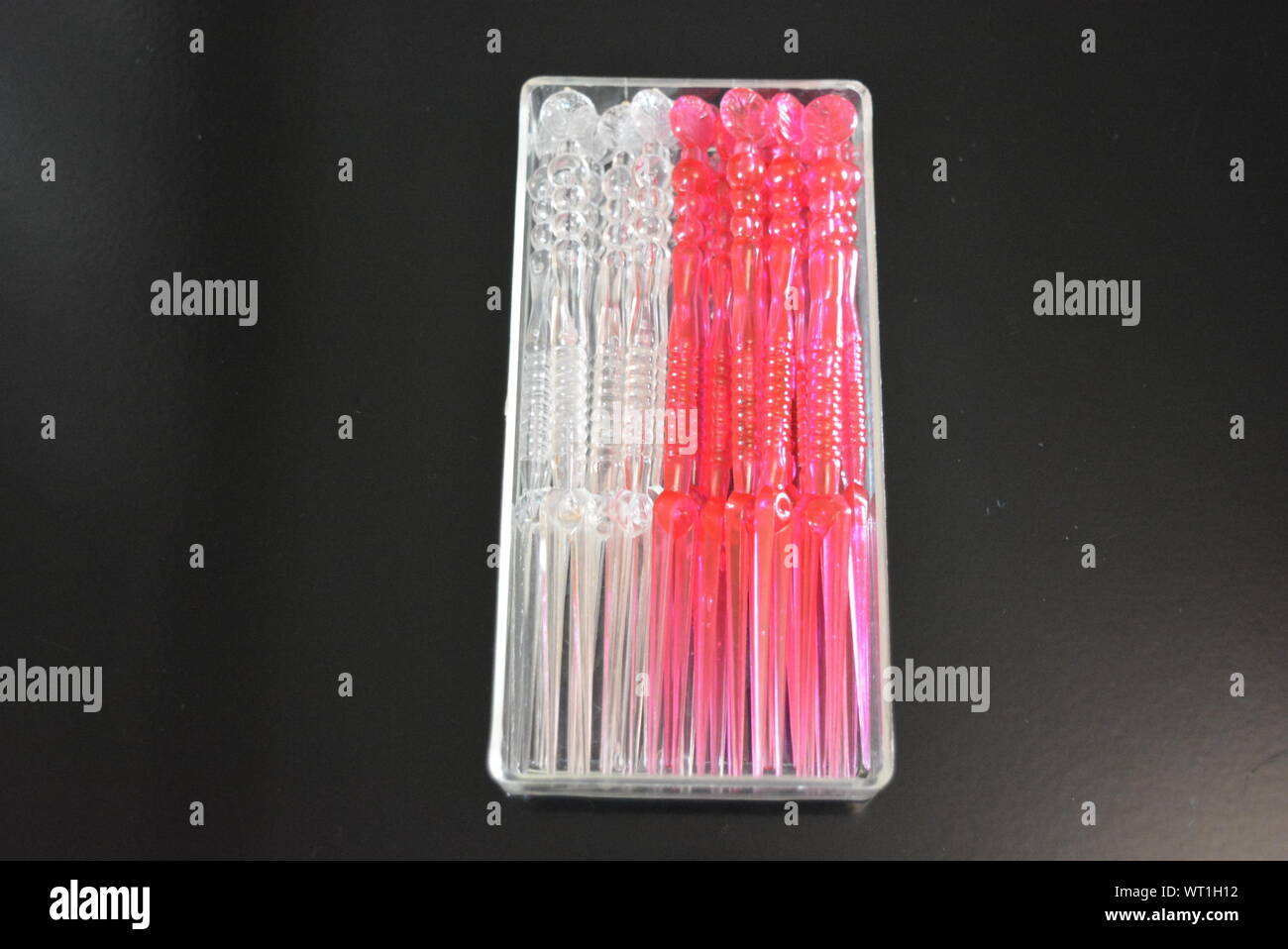 Transparent and red plastic sticks for small sandwiches and canapes in ...