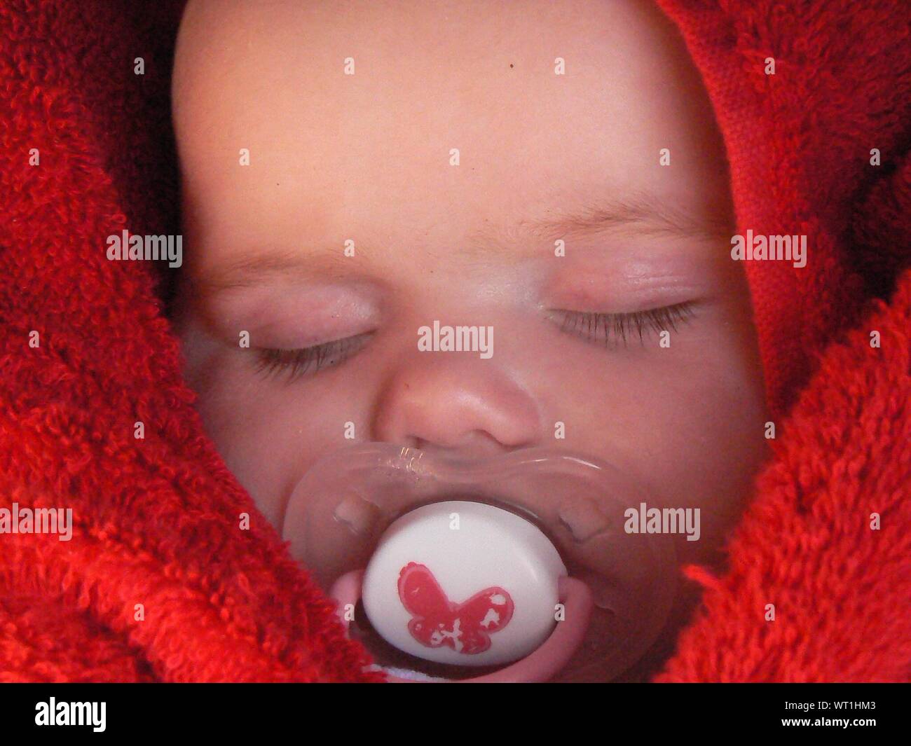 Red pacifier hi-res stock photography and images - Alamy