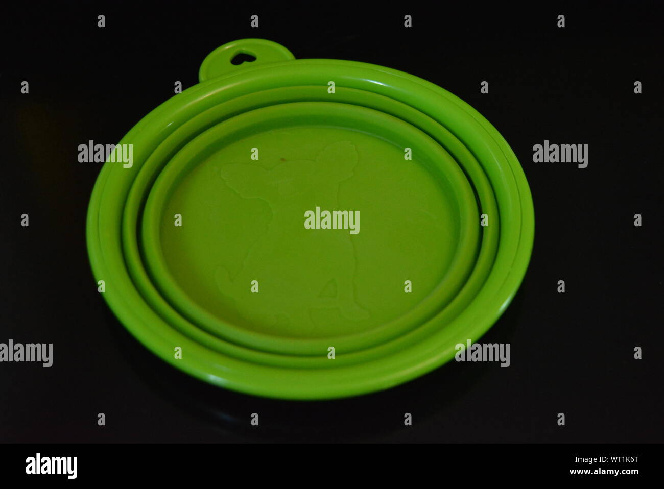 Green folding and multifunctional rubber plate, a bowl with a plastic ...