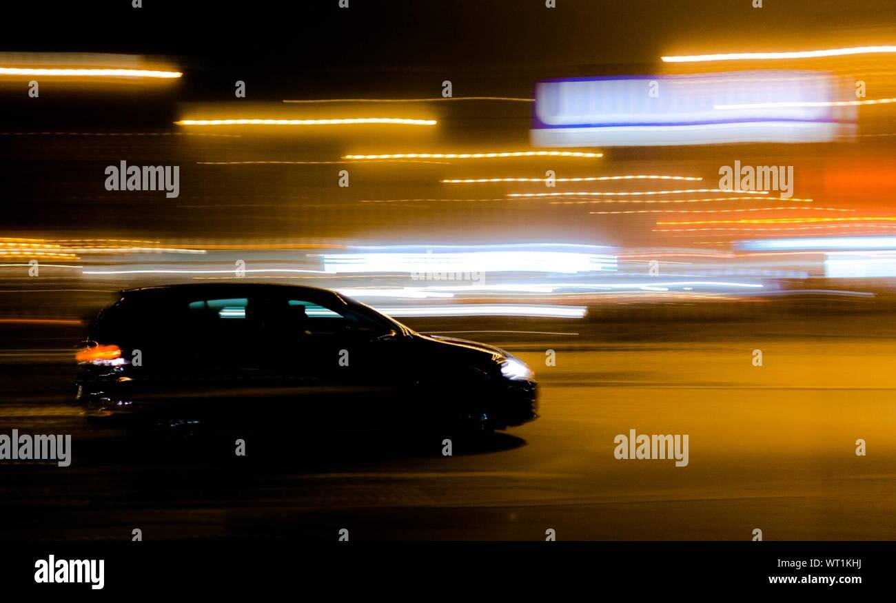 Car driving at night city with blur motion hi-res stock photography and ...
