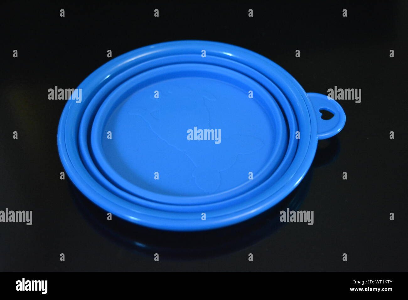 Blue folding and multifunctional rubber plate, a bowl with a plastic ...