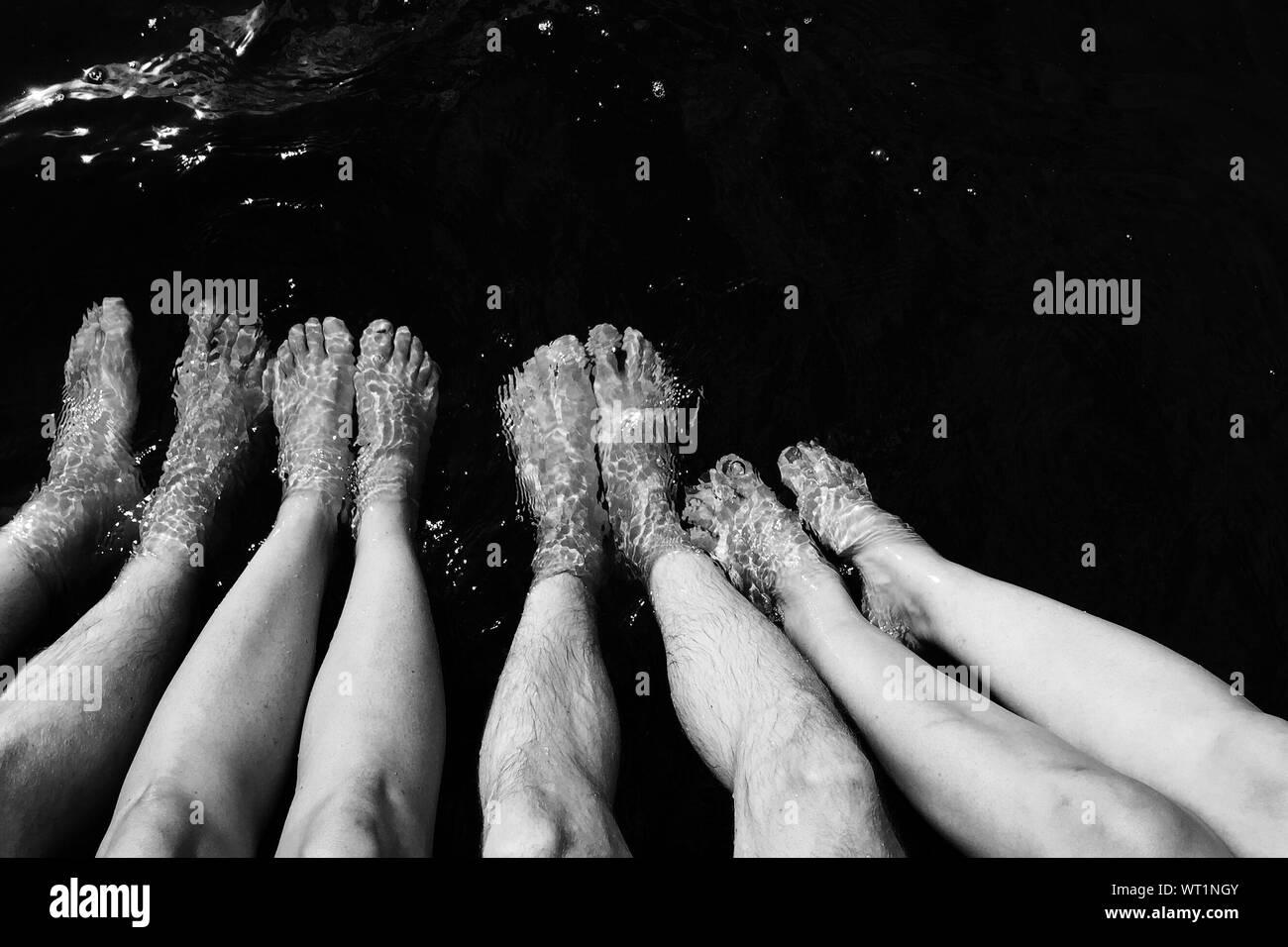 With their feet in the water hi-res stock photography and images - Alamy