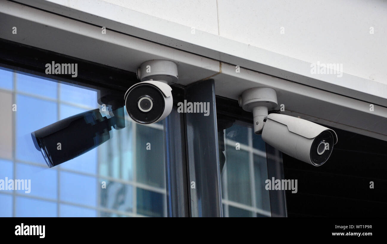 closed circuit camera Multi-angle CCTV system against the blue sky ...