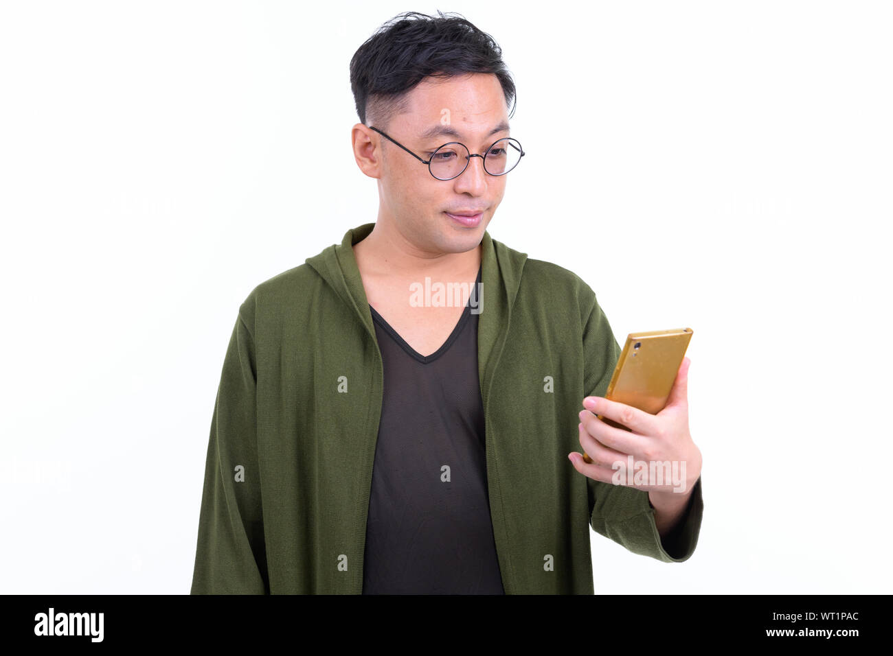 Portrait of Japanese man with eyeglasses using phone Stock Photo - Alamy
