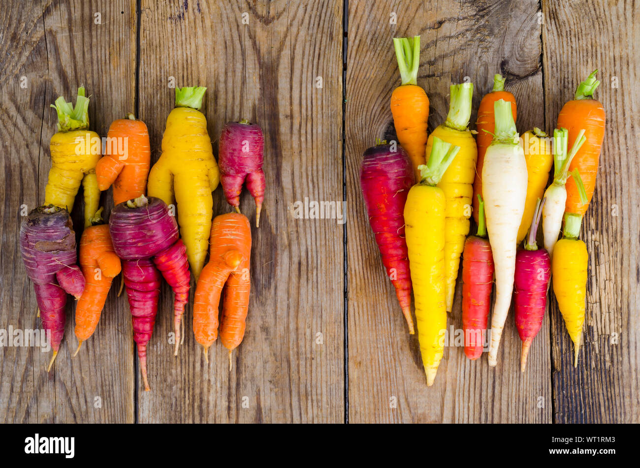 Odd shaped carrots hi-res stock photography and images - Alamy