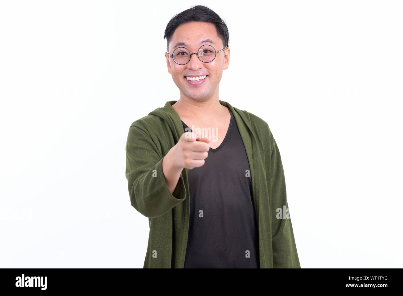 Happy Japanese man with eyeglasses pointing at camera Stock Photo - Alamy