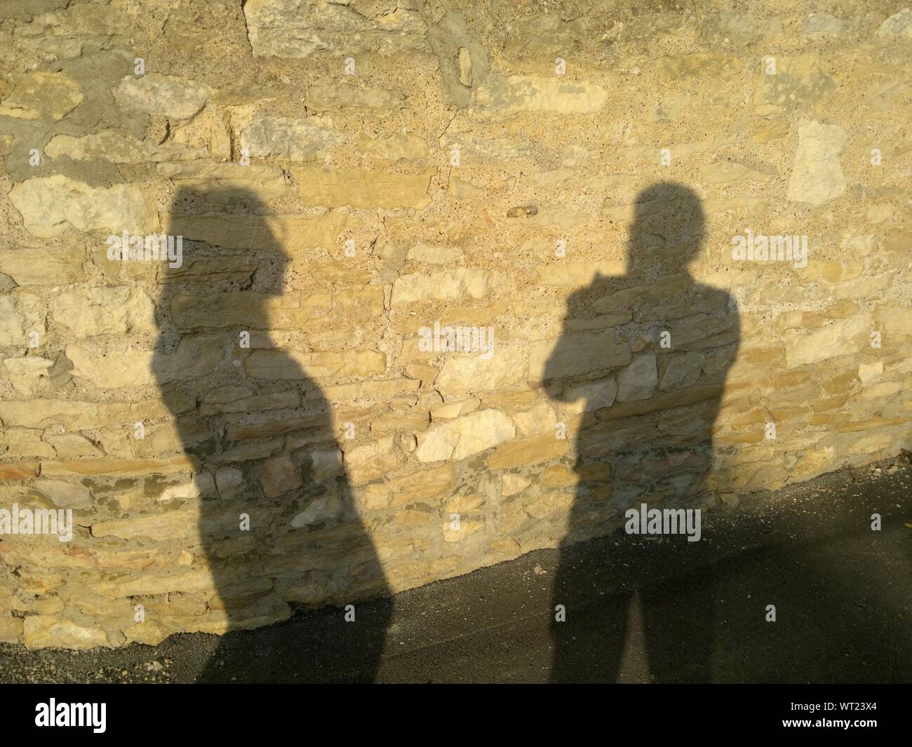 People casting shadow hi-res stock photography and images - Alamy