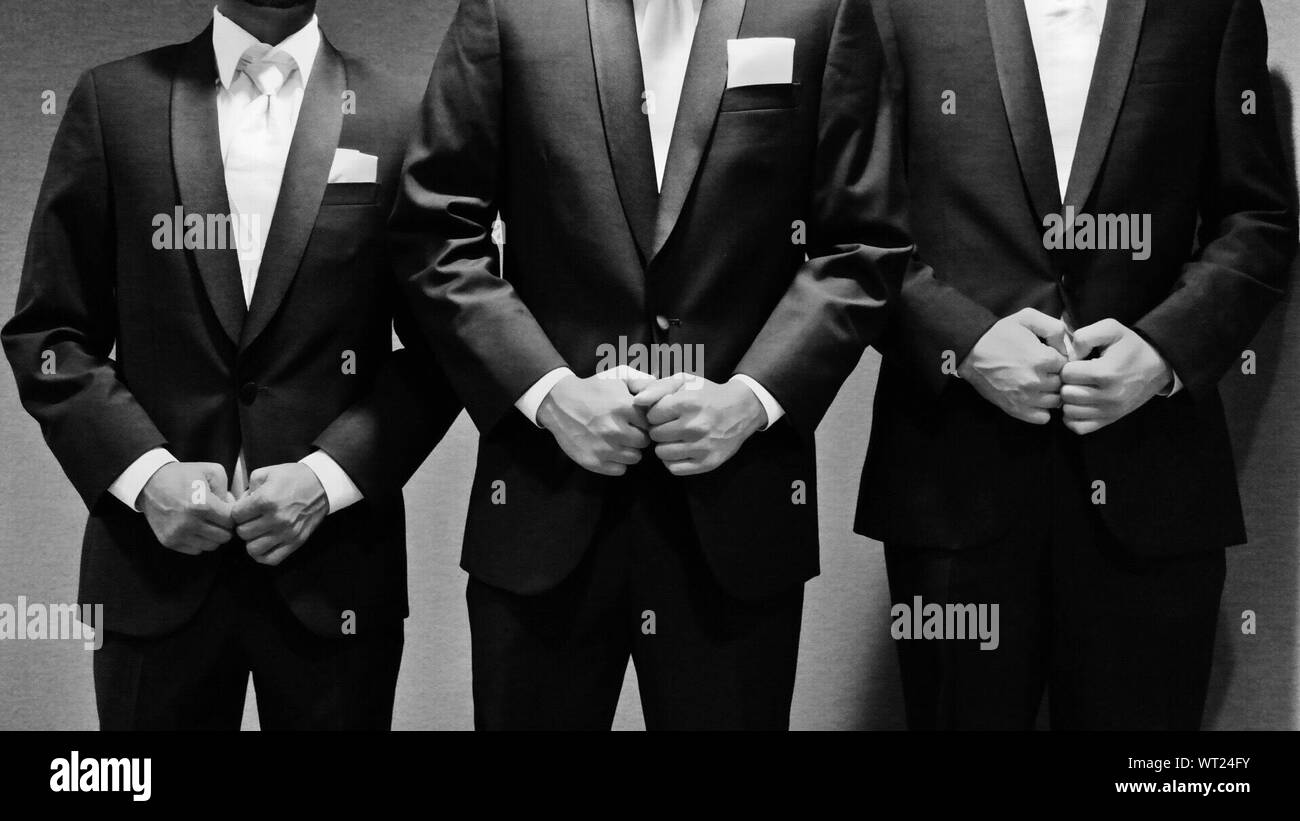 Wearing suit suits hi-res stock photography and images - Alamy