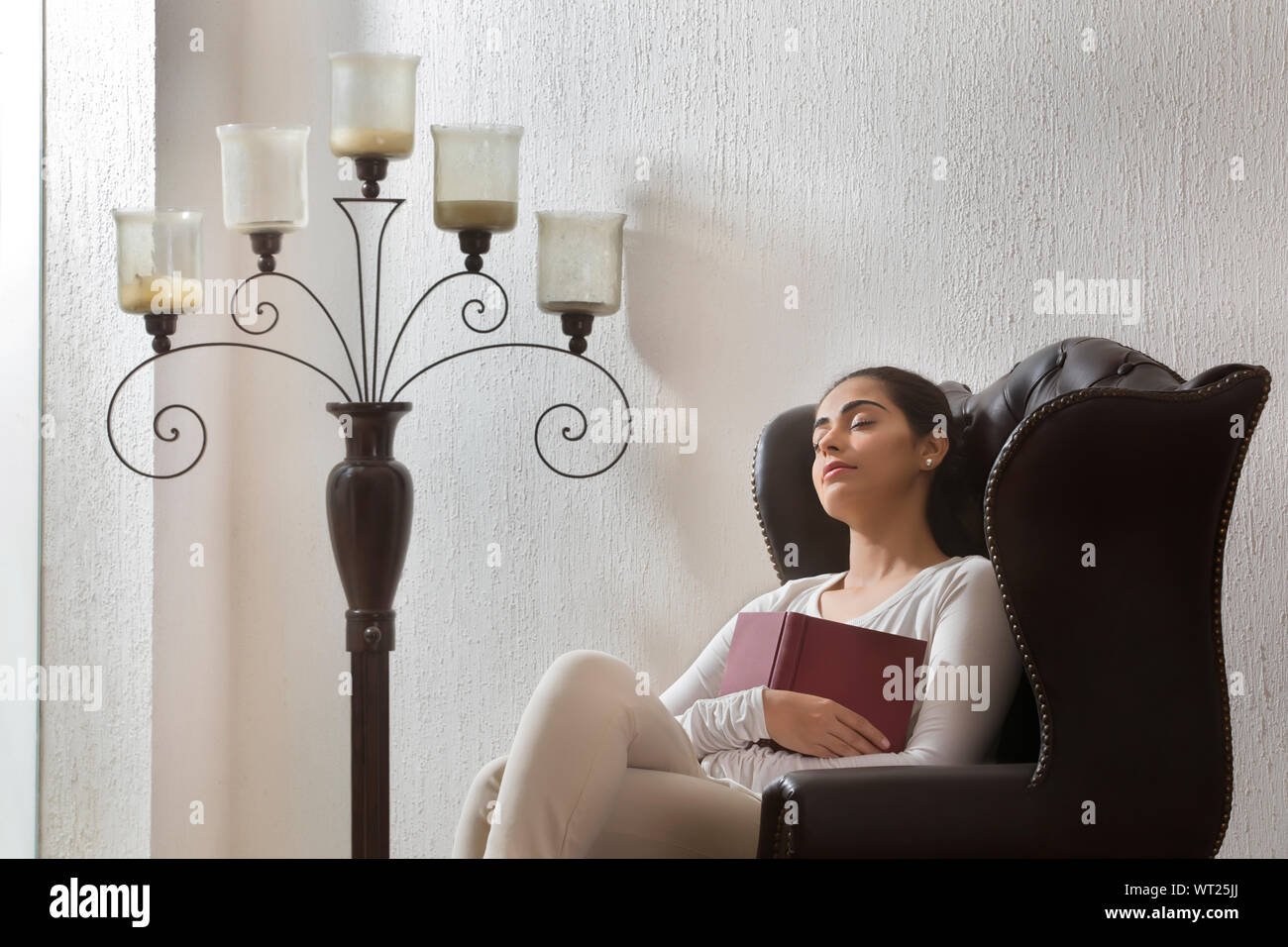 Sleeping in a chair hi-res stock photography and images - Alamy