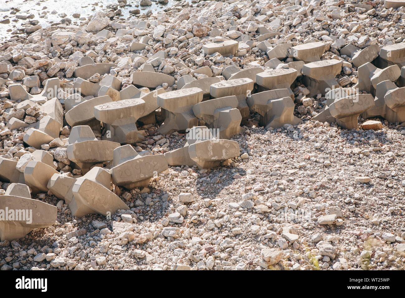 Concrete blocks or breakwaters on the seashore or concrete heavy ...