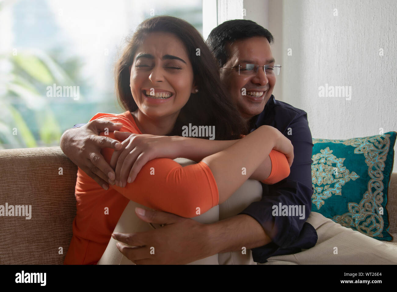 husband and wife having a quality time at home Stock Photo - Alamy