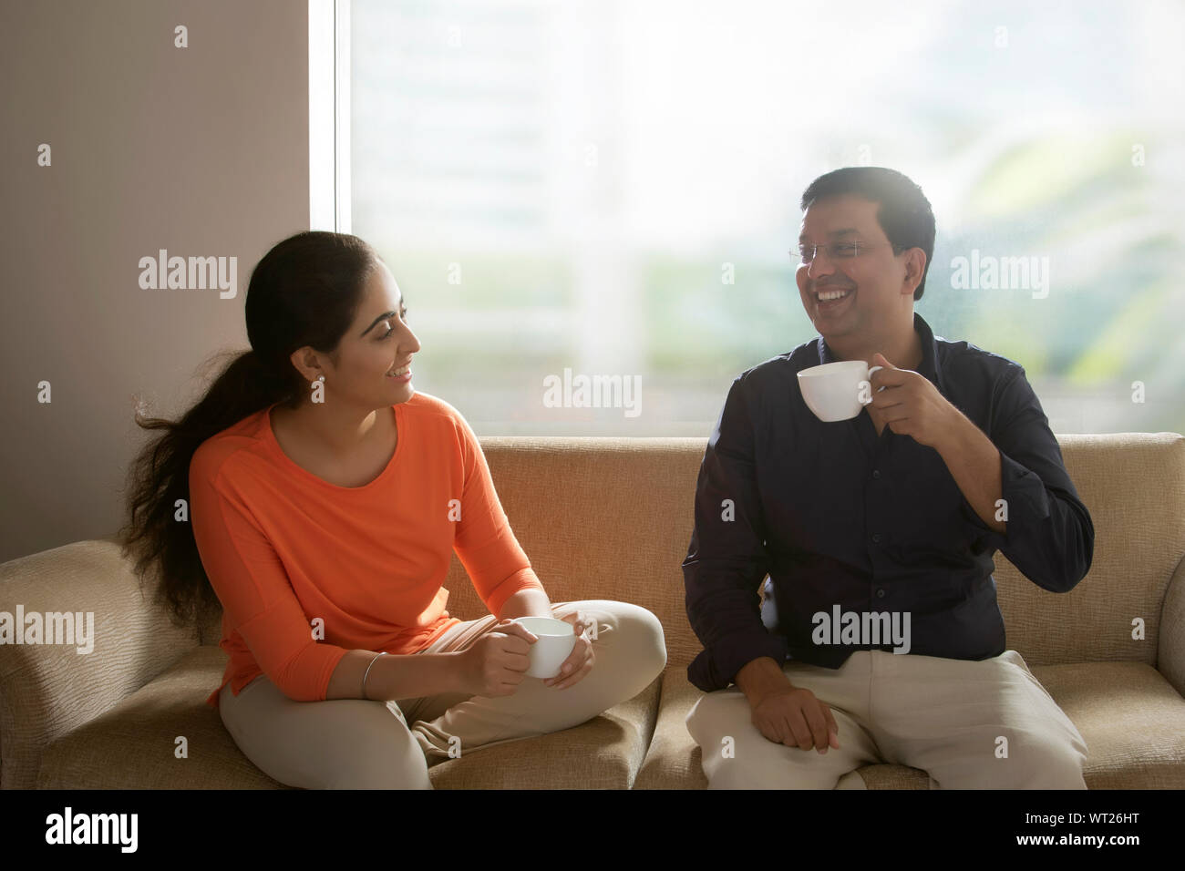 husband and wife having tea together Stock Photo - Alamy