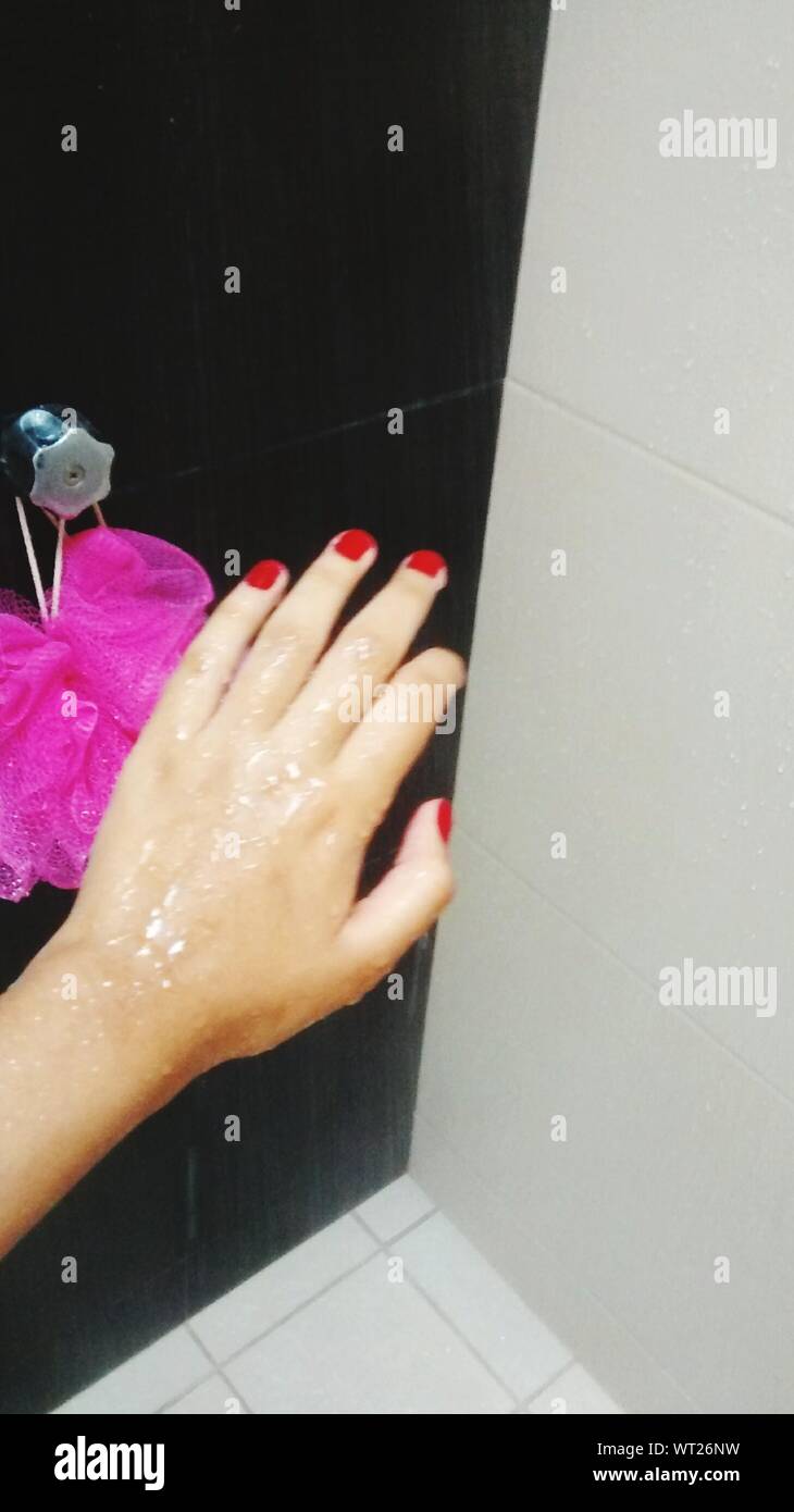 Wet hand hi-res stock photography and images - Alamy
