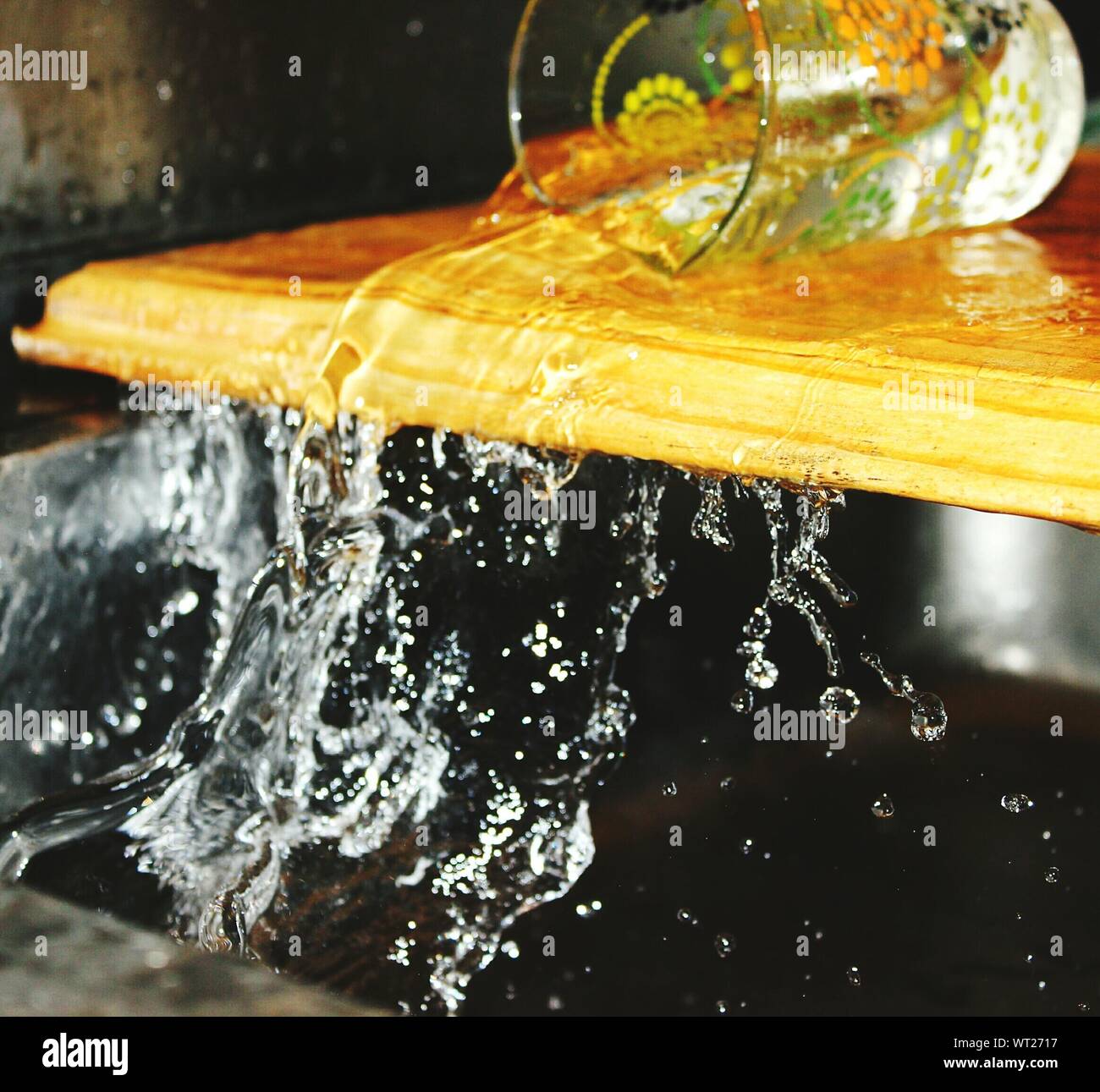 Water spilling hi-res stock photography and images - Alamy