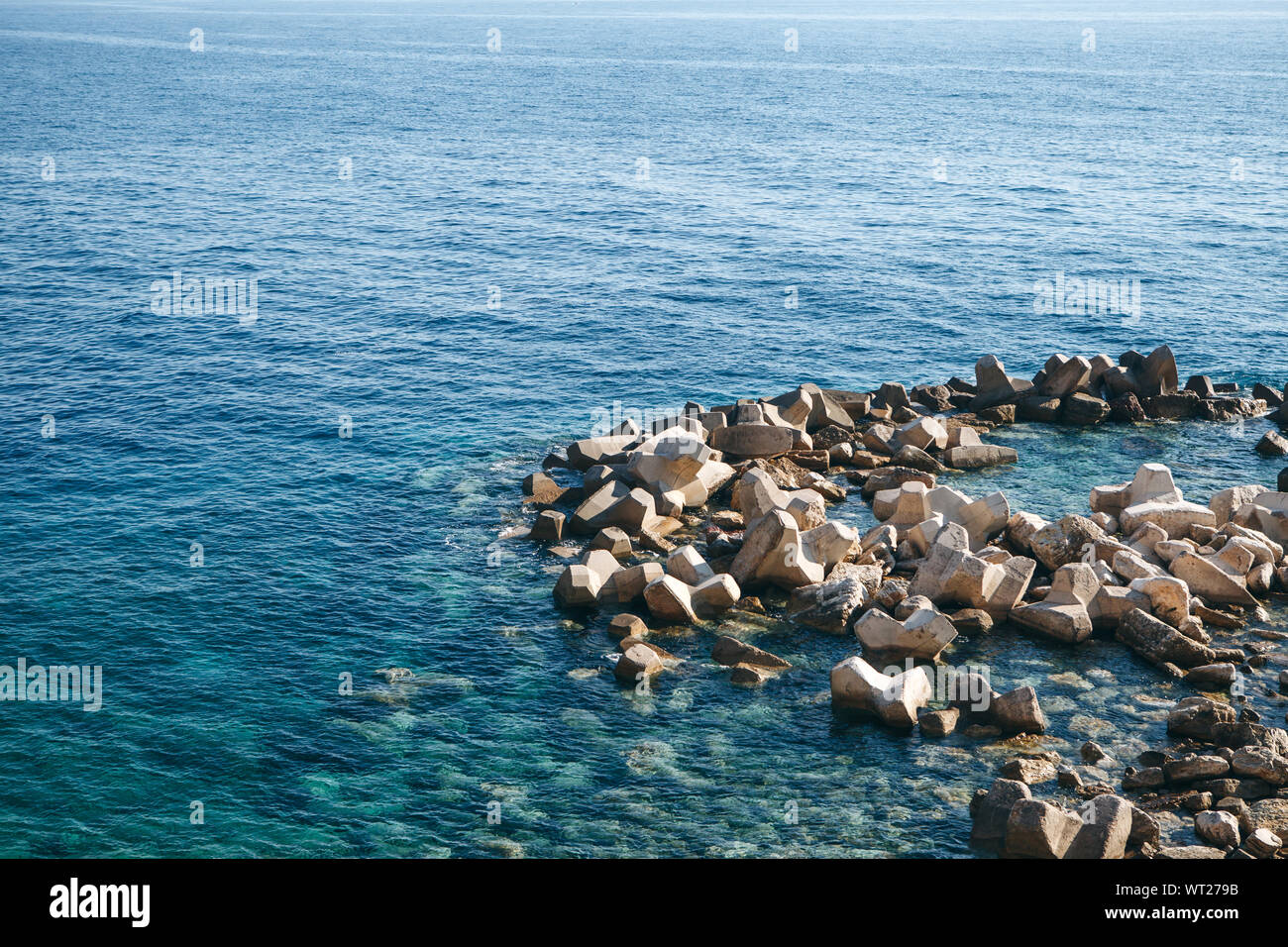 Concrete blocks or breakwaters on the seashore or concrete heavy ...