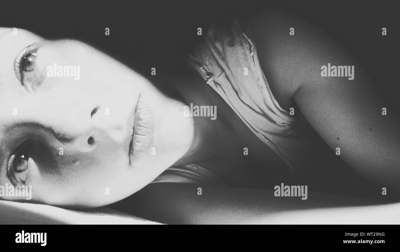 Woman lying down looking up Black and White Stock Photos & Images - Alamy