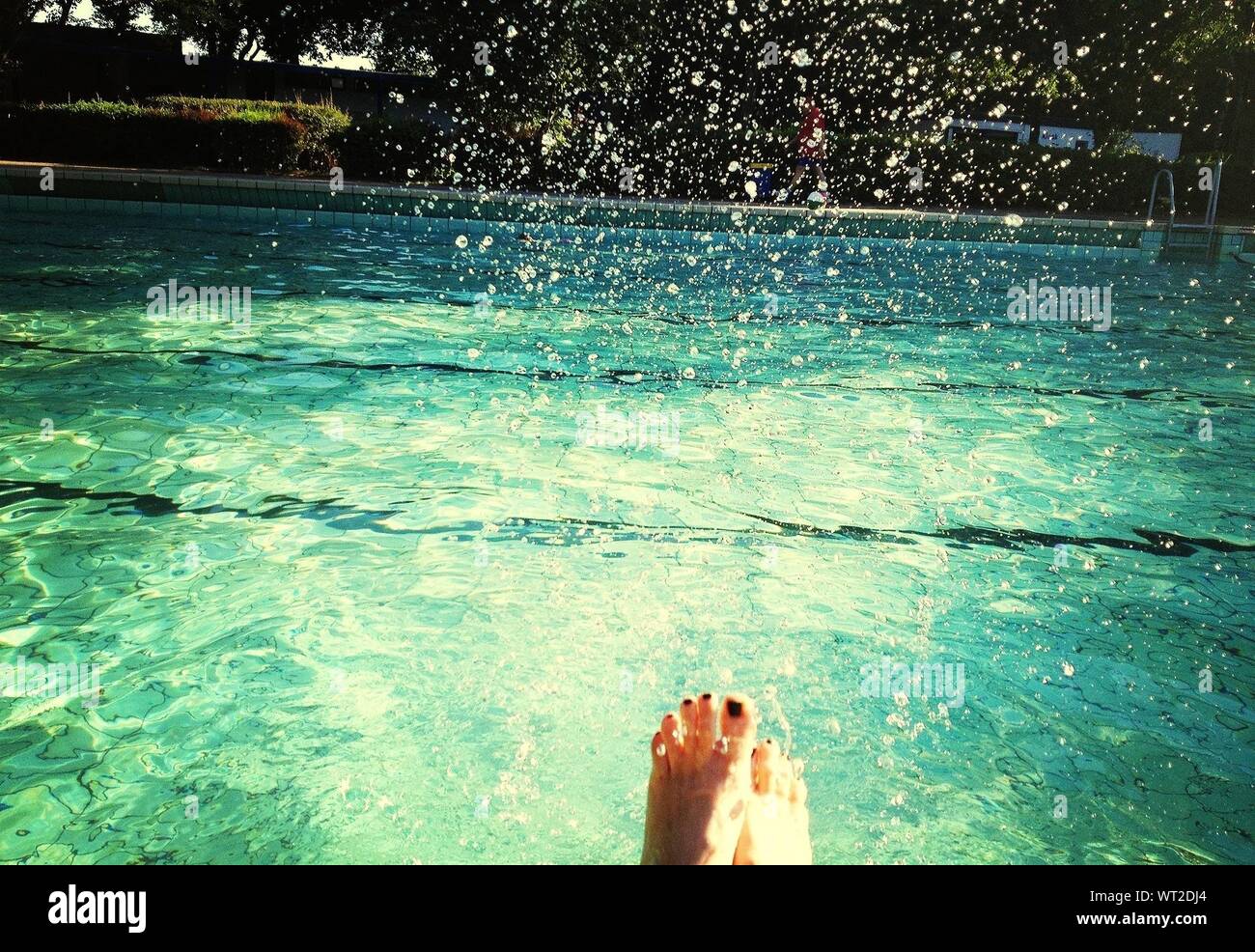 Feet in pool hi-res stock photography and images - Alamy