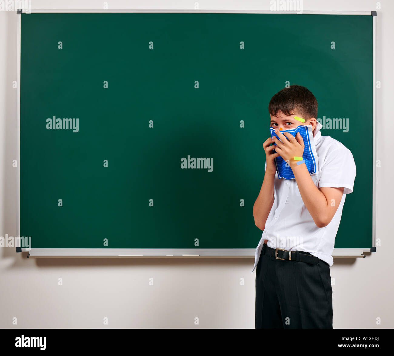 Portrait of funny pupil. School boy very emotional, having fun and very ...