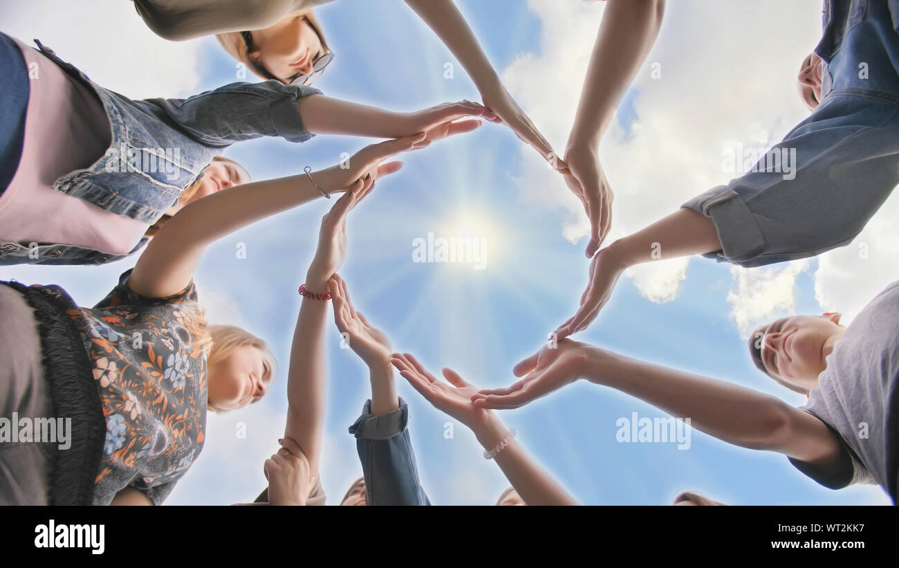 Conceptual symbol of cooperation diverse hands making a circle ...