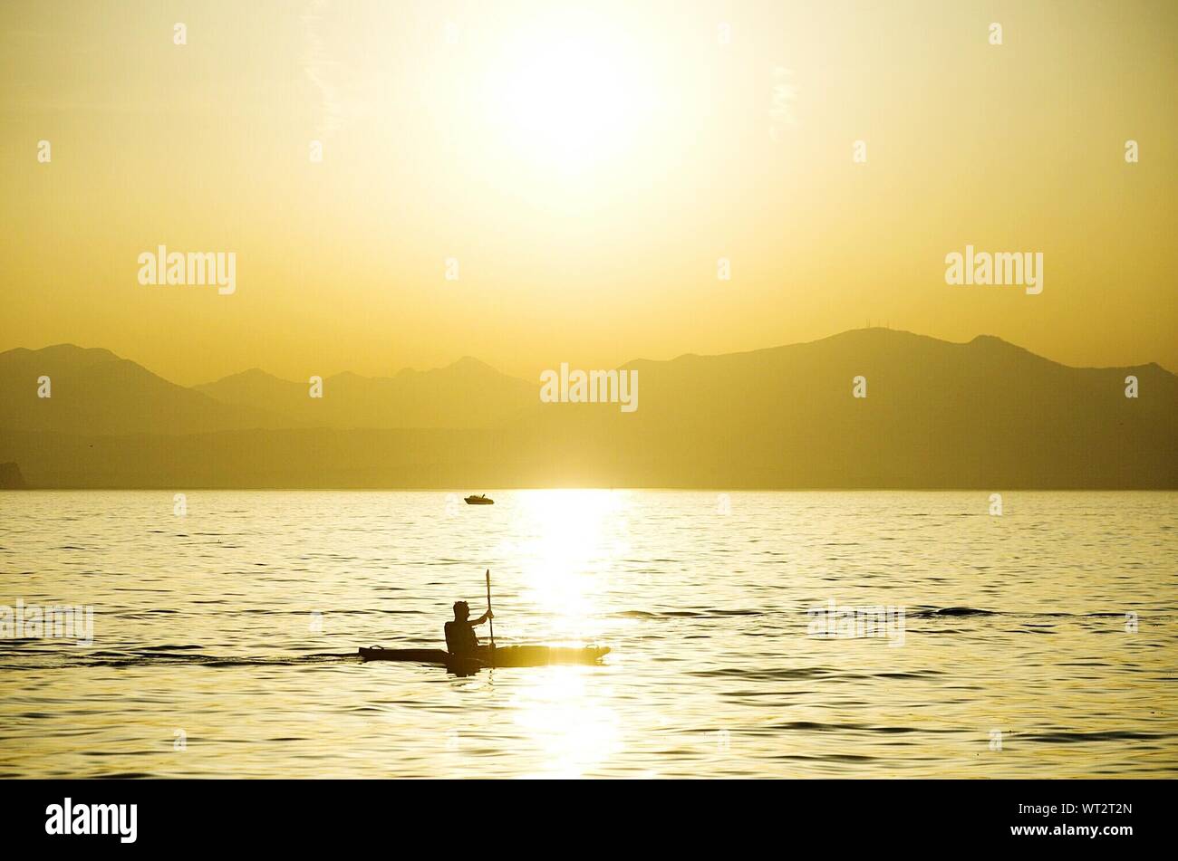 Man floating water silhouette hi-res stock photography and images - Alamy