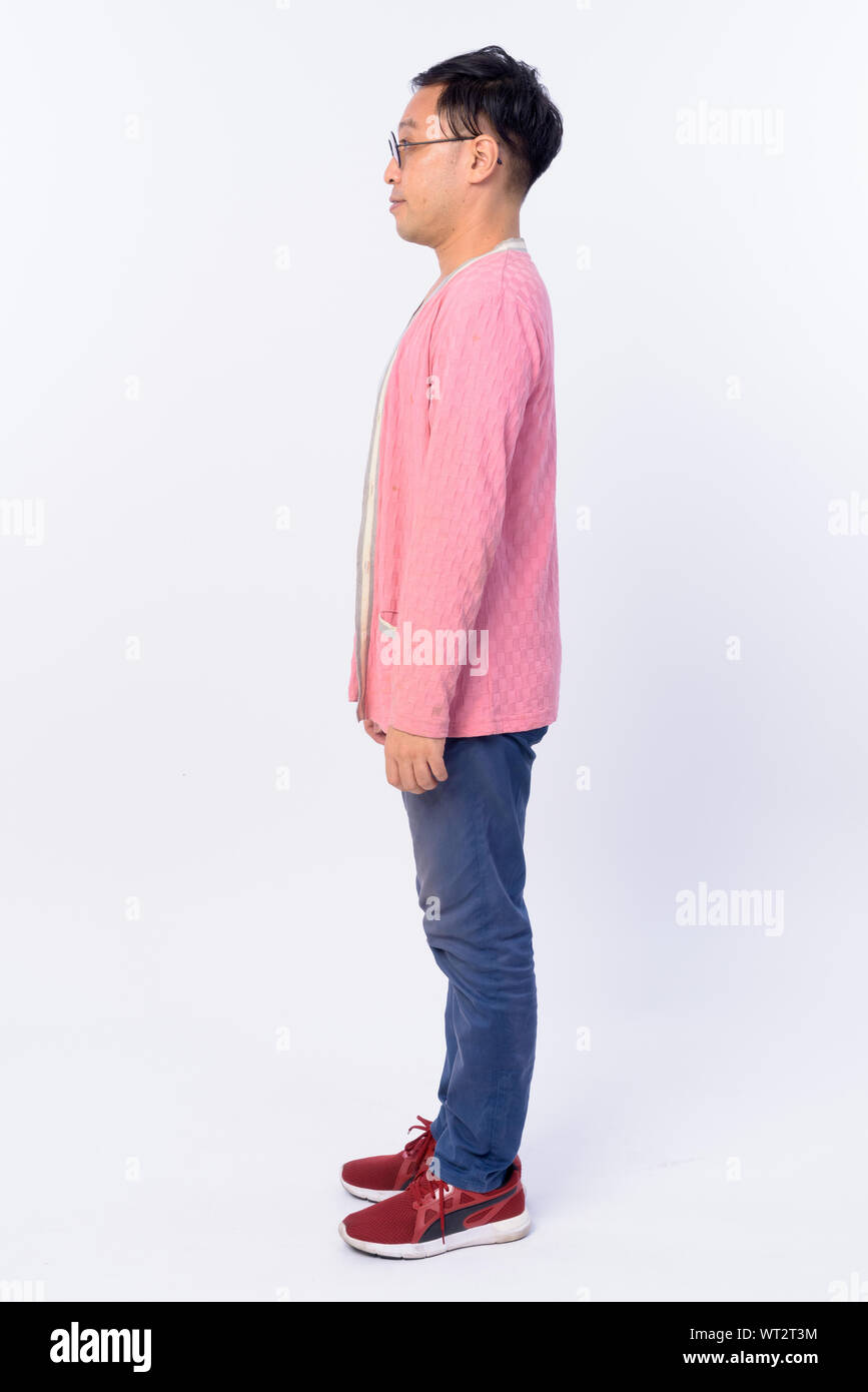 Full body shot profile view of Japanese man with eyeglasses Stock Photo ...