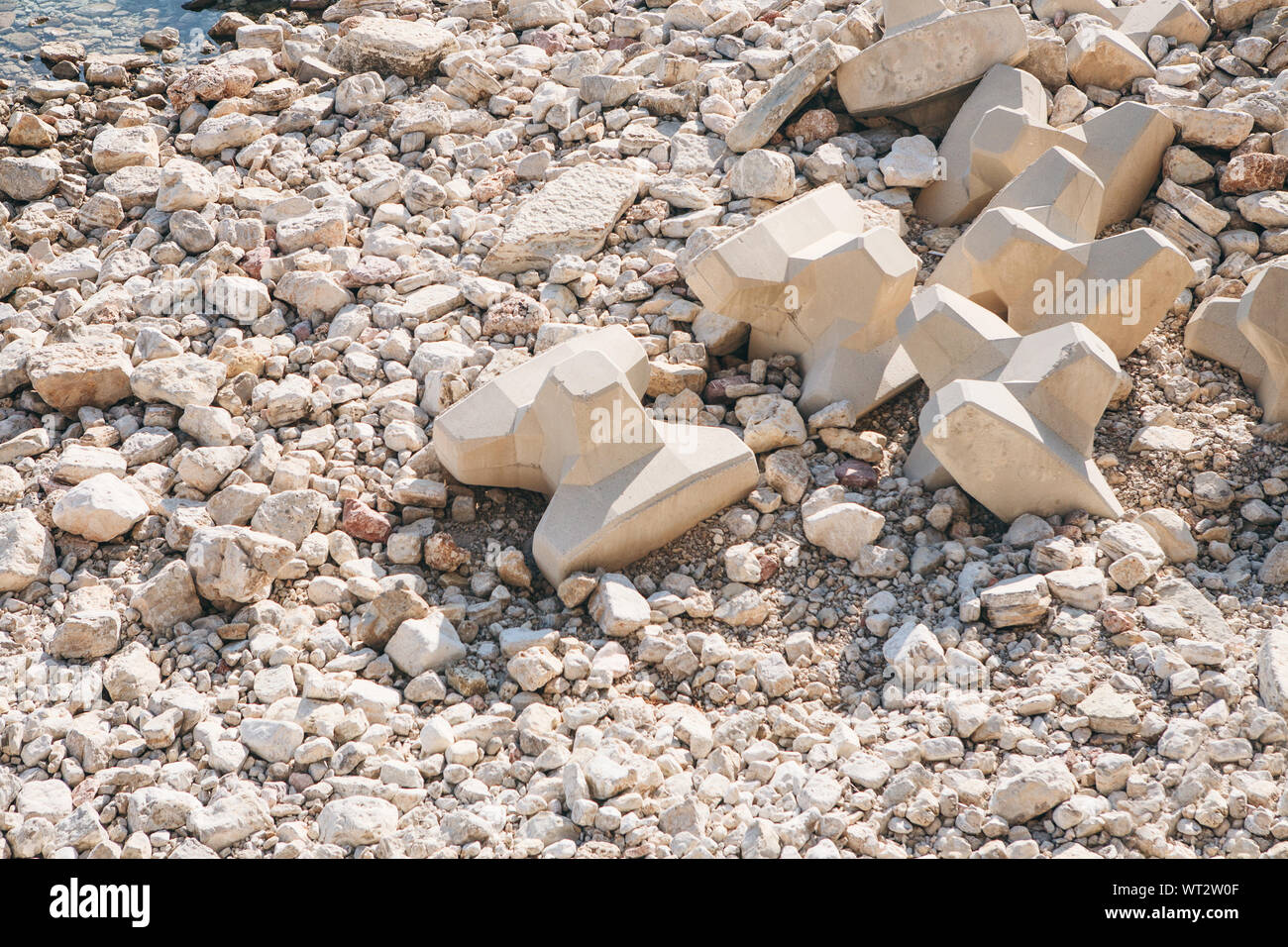Concrete blocks or breakwaters on the seashore or concrete heavy ...
