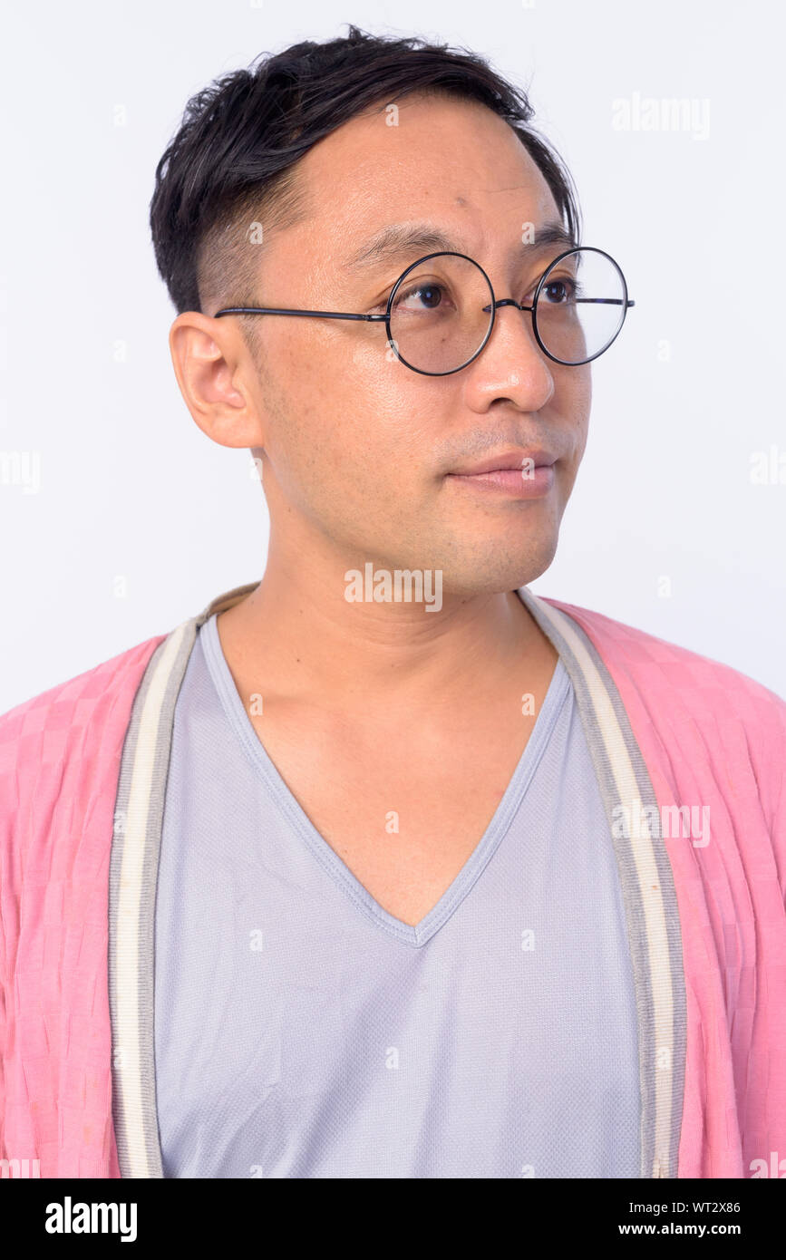 Face of Japanese man with eyeglasses thinking Stock Photo - Alamy