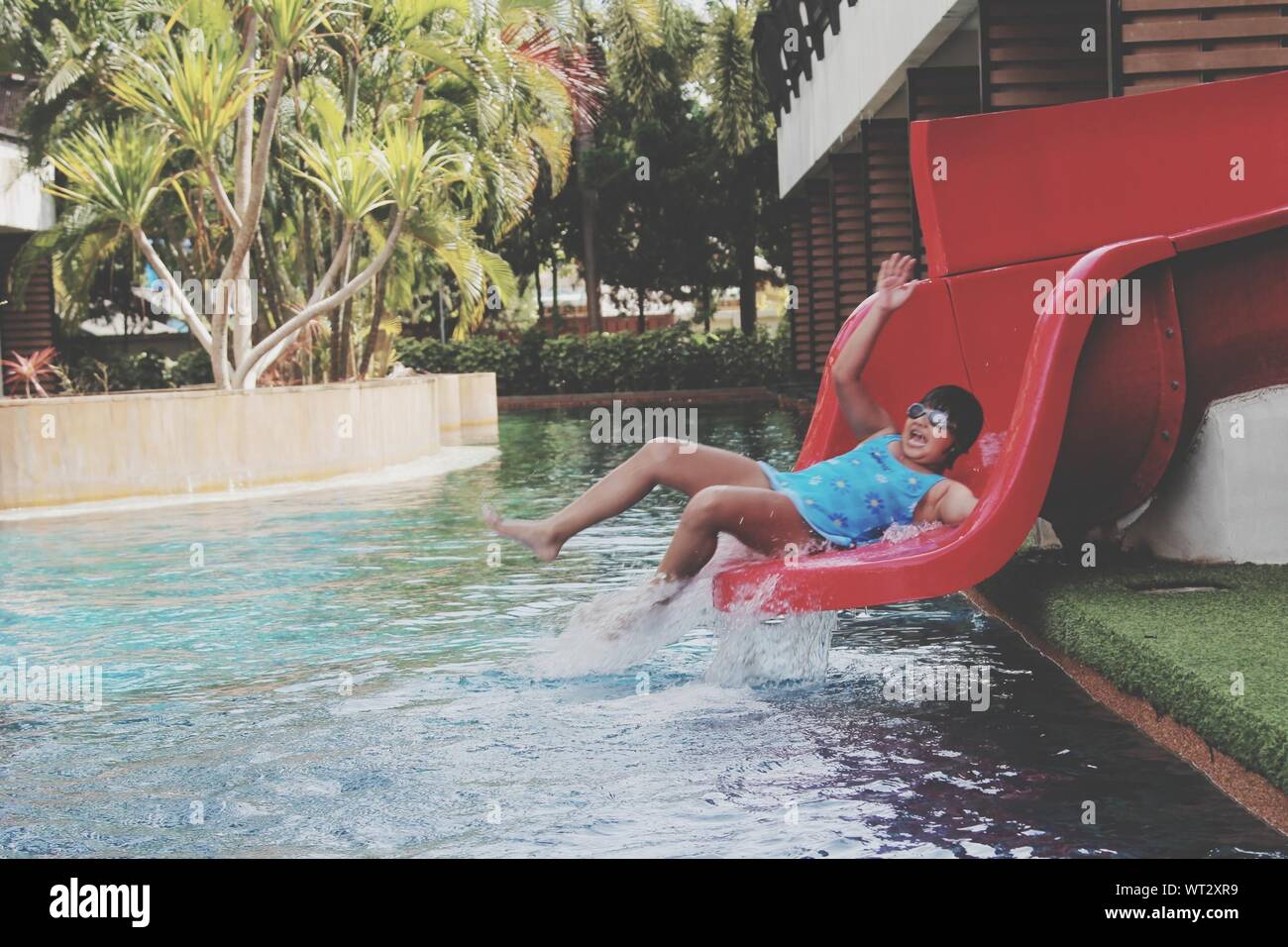 Girl water slide hi-res stock photography and images - Alamy