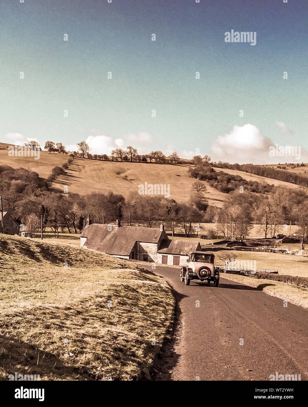 Car country road hill road hi-res stock photography and images - Alamy